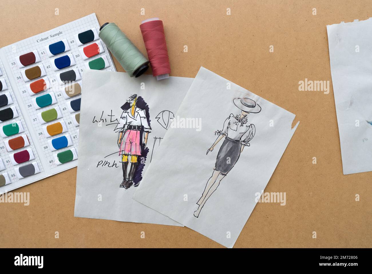 Fashion designer room. Pattern for cloth, color sample catalog and ...