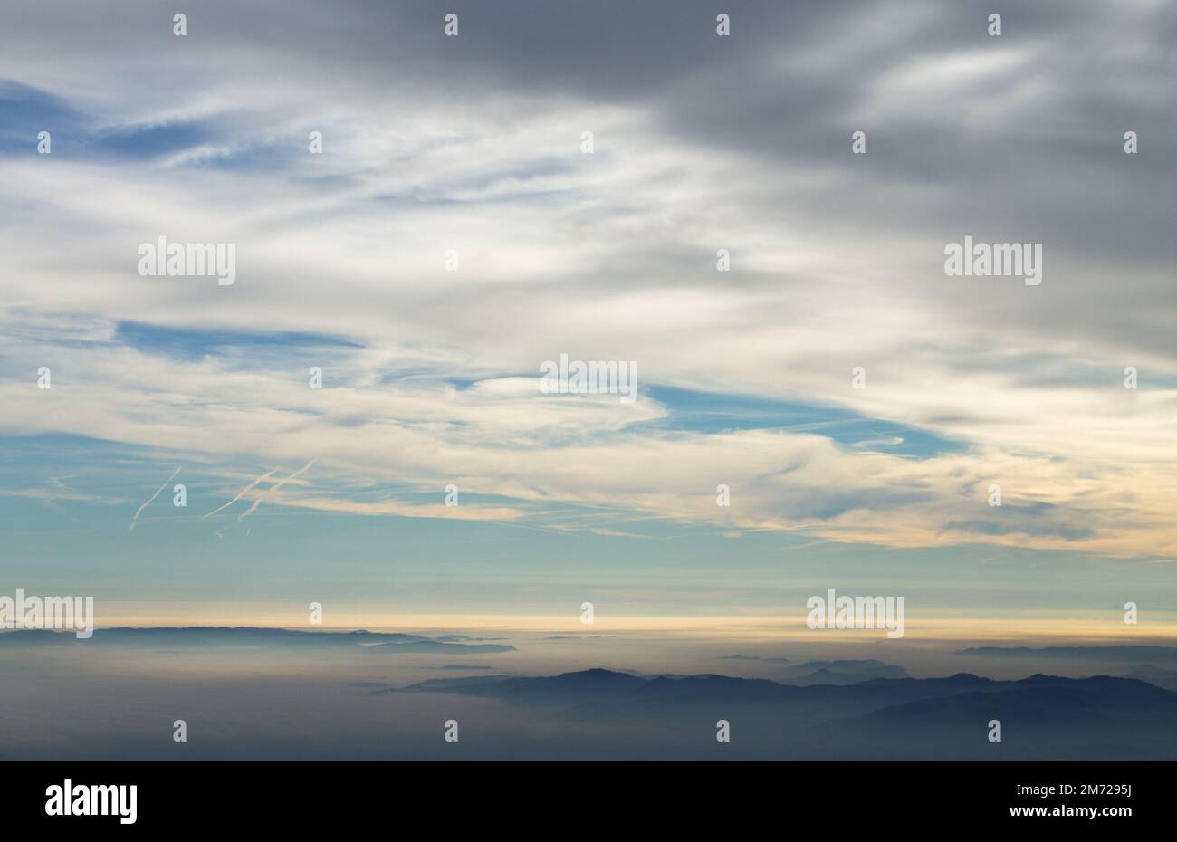 Sky with clouds over foggy plain. Sky background Stock Photo - Alamy