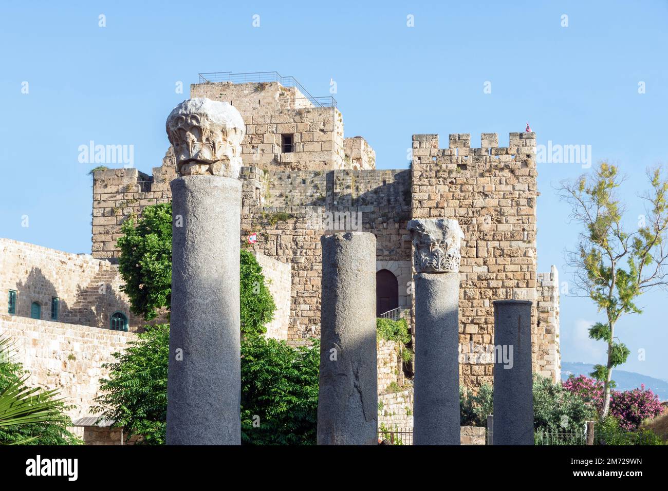 Roman columns and Byblos citadel, Crusader castle, Jbeil, Lebanon Stock ...