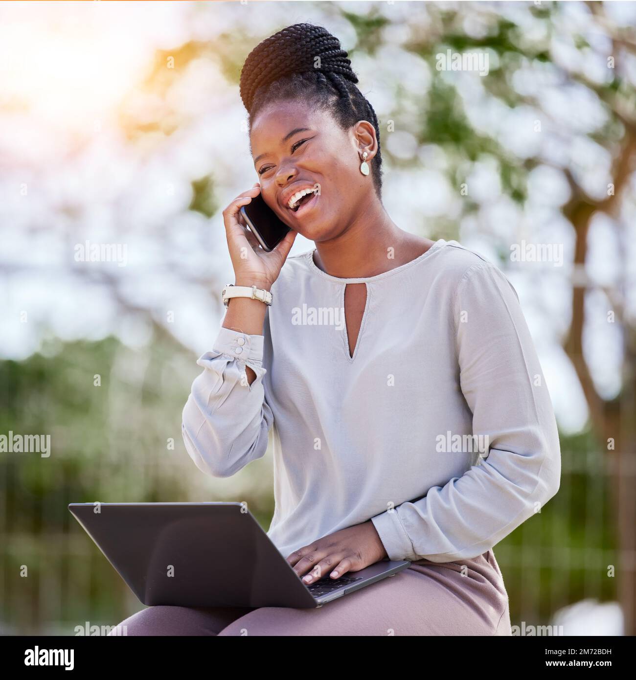 Black woman, laptop and phone call outdoor for business conversation ...