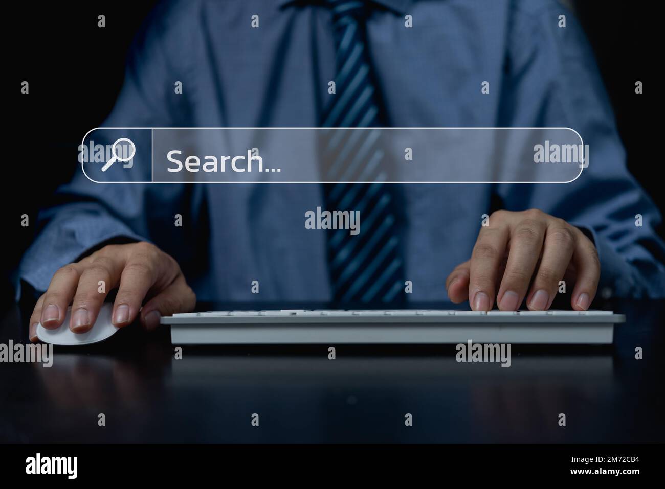 Data search Technology information concept. man hands are using a computer keyboard digital ...