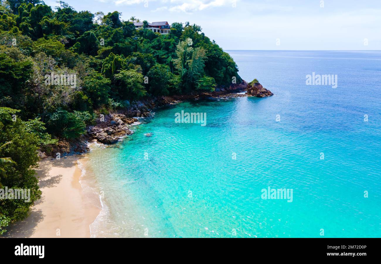 Drone aerial view at Banana beach with palm trees in Phuket Thailand ...