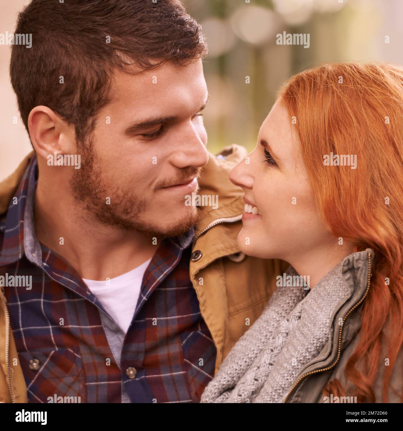 You make my heart smile. a happy young couple getting lost in each ...