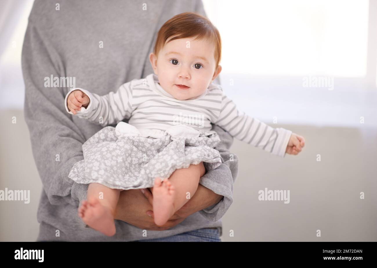 Wait mommy, let me show them how I walk. An adorable baby girl being ...