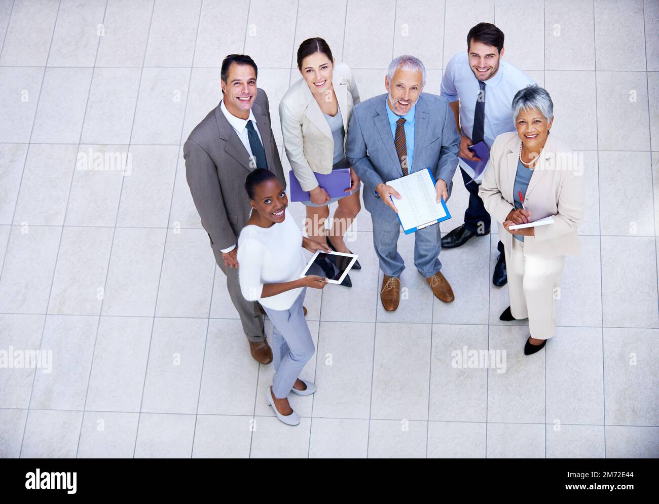 Group professionals working together hi-res stock photography and ...