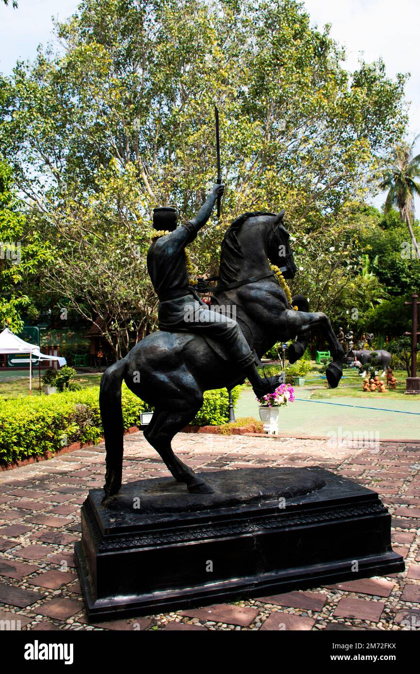 Ancient sculpture figure or antique carving statue in Khum Khun Phaen garden park in Wat Khae ...