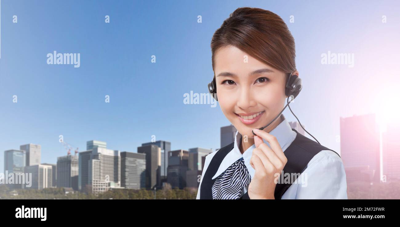 The female customer service personnel Stock Photo - Alamy