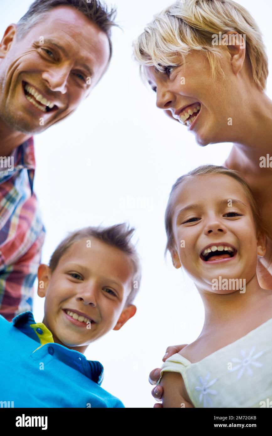 A family theyre proud of. A low angle portrait of a happy family ...