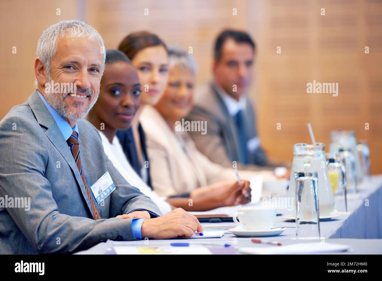 Ready for another day of journalism. A portrait of happy members of the ...