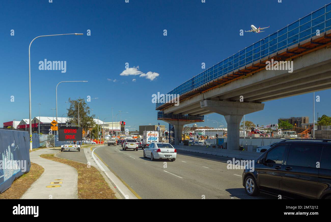 An aircraft landing above the 'Sydney Gateway' road expansion and ...