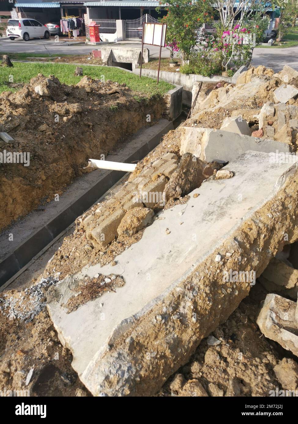 pile of broken concrete slab by the roadside Stock Photo - Alamy