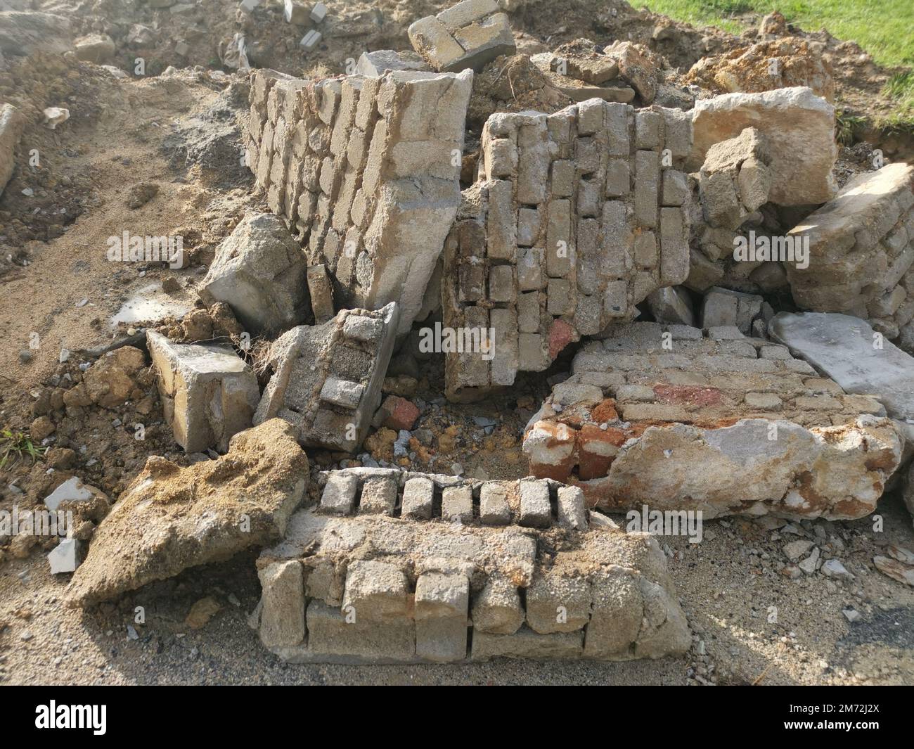 pile of broken concrete slab by the roadside Stock Photo - Alamy
