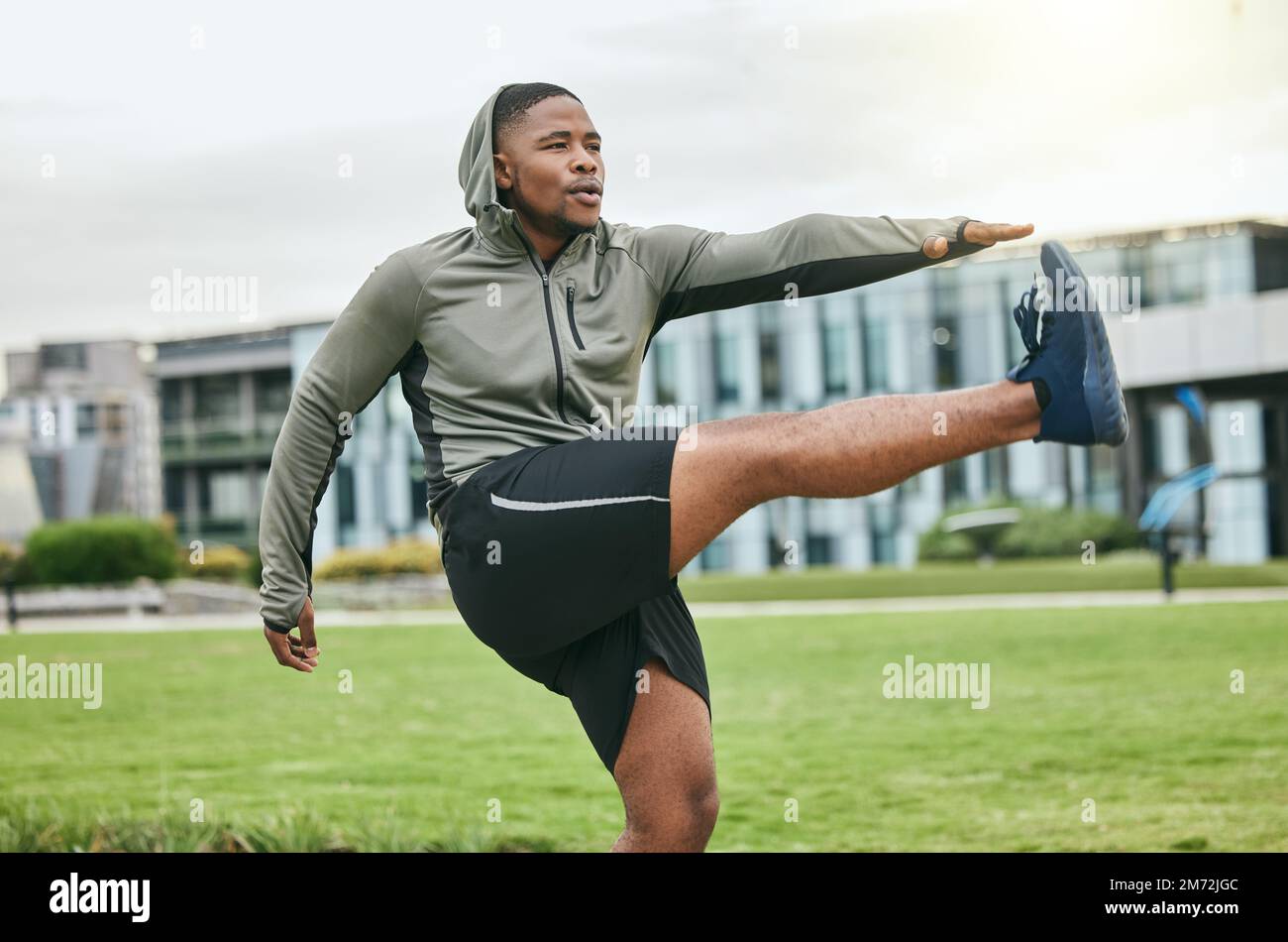 Fitness, running and stretching with a sports black man getting ready ...