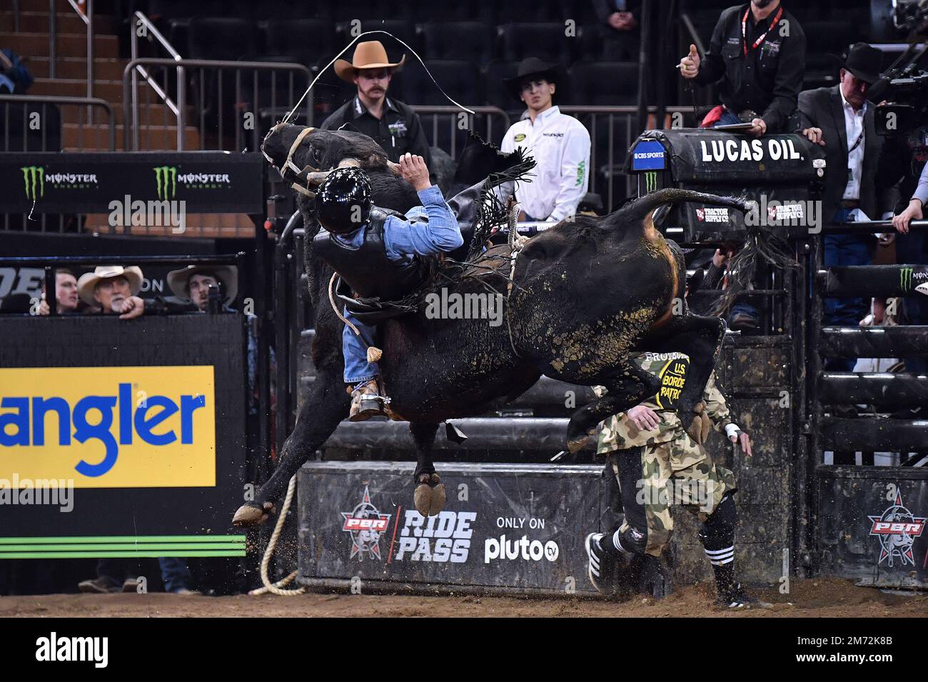 Professional Bull Rider Alex Cerqueira rides a bull named Viper during PBR Monster Energy ‘Buck ...