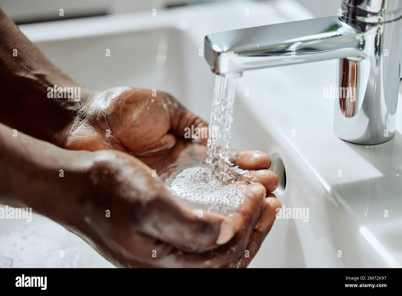 Black man, house bathroom or washing hands with water for healthcare ...