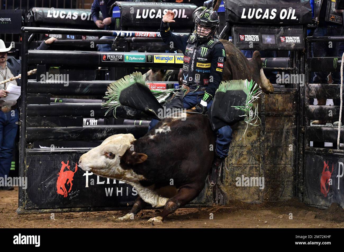 Professional Bull Rider Derek Kolbaba (USA) rides a bull named Salty ...