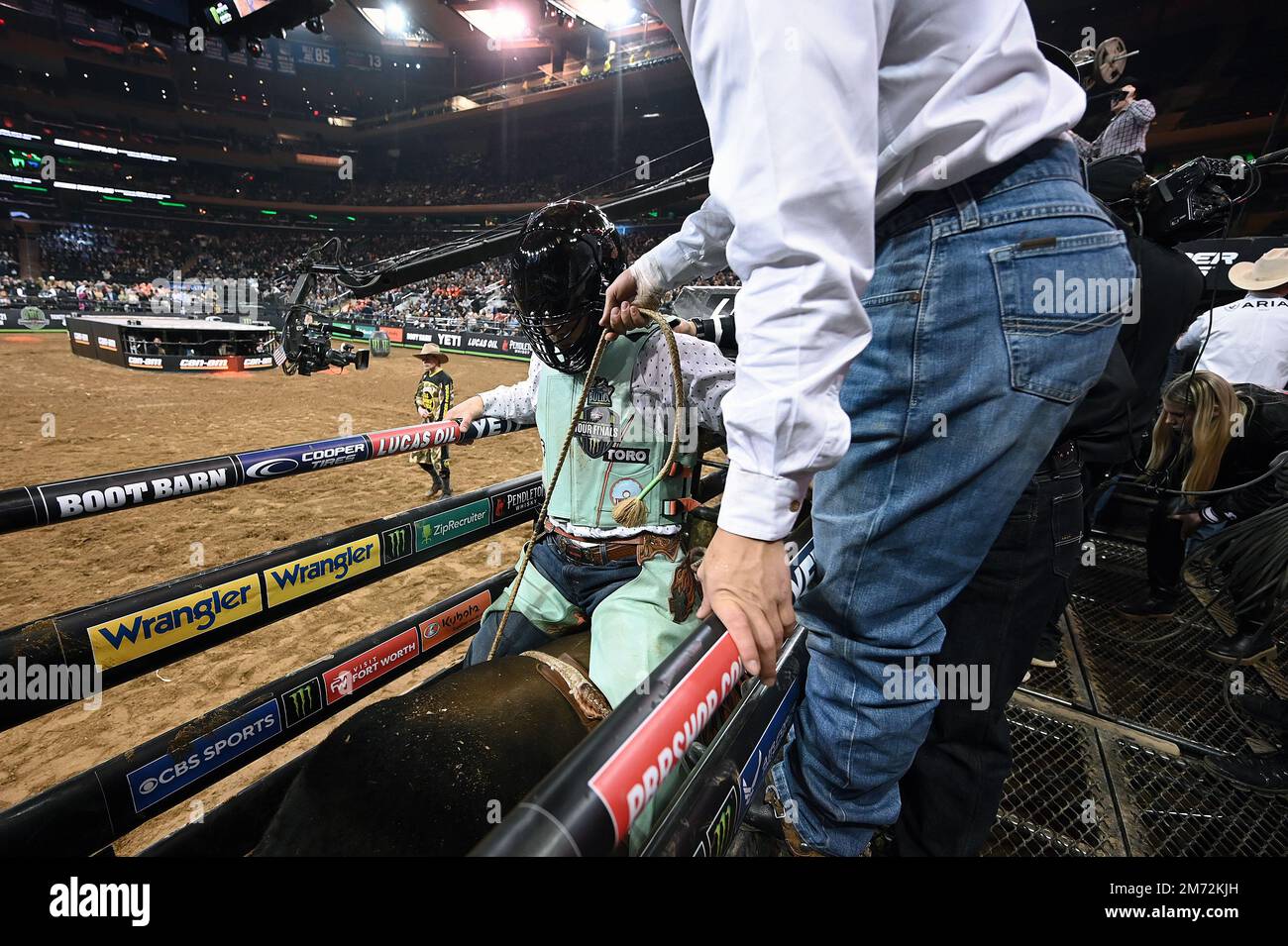 Professional Bull Rider Thiago Salgado (BRA) prepares to ride a bull during PBR Monster Energy ...