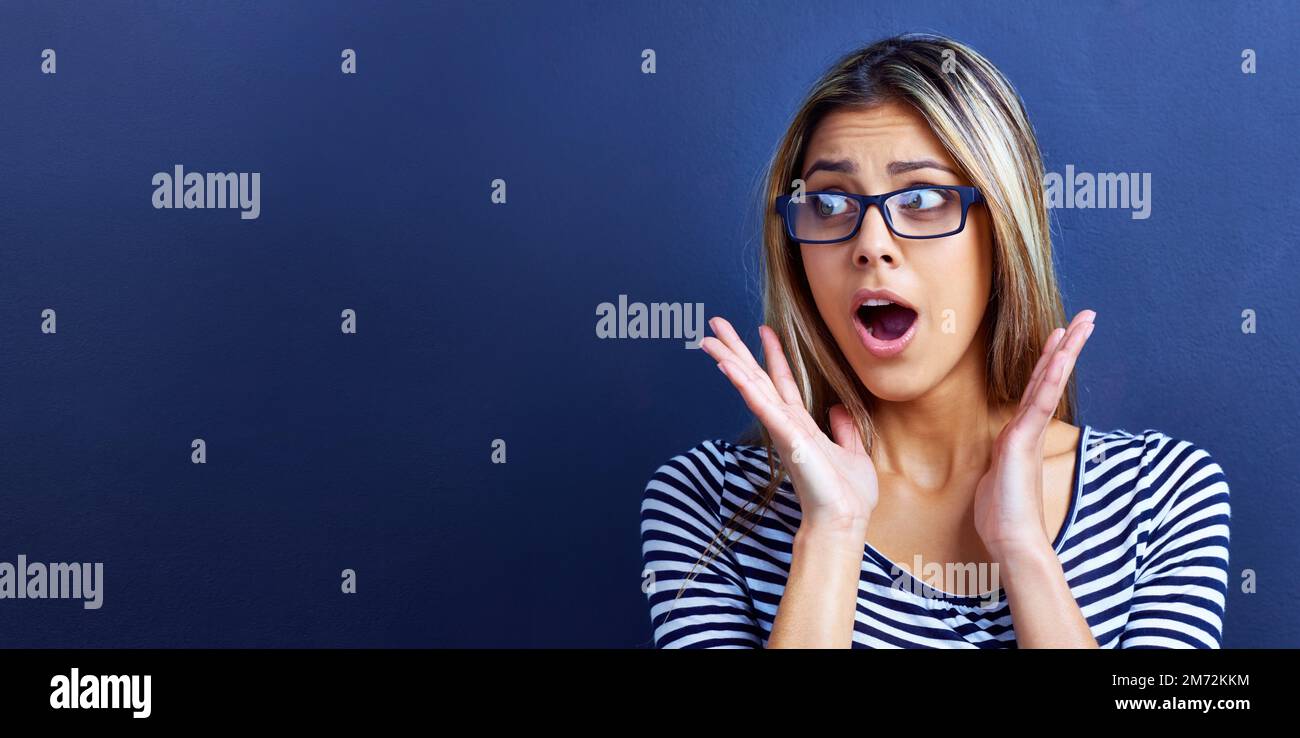 Shocked blond woman glasses hi-res stock photography and images - Alamy