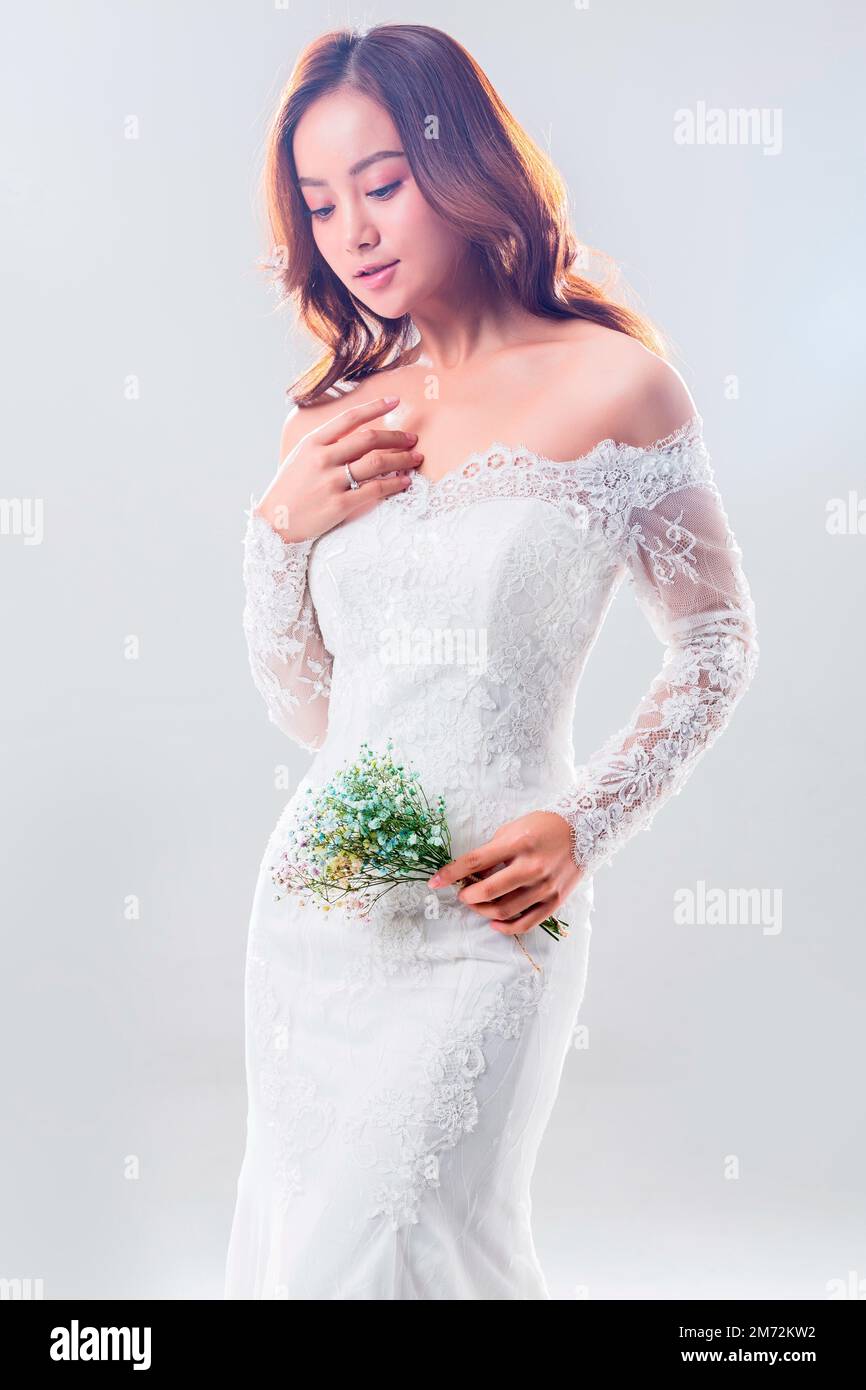 Happy and sweet bride and groom Stock Photo - Alamy