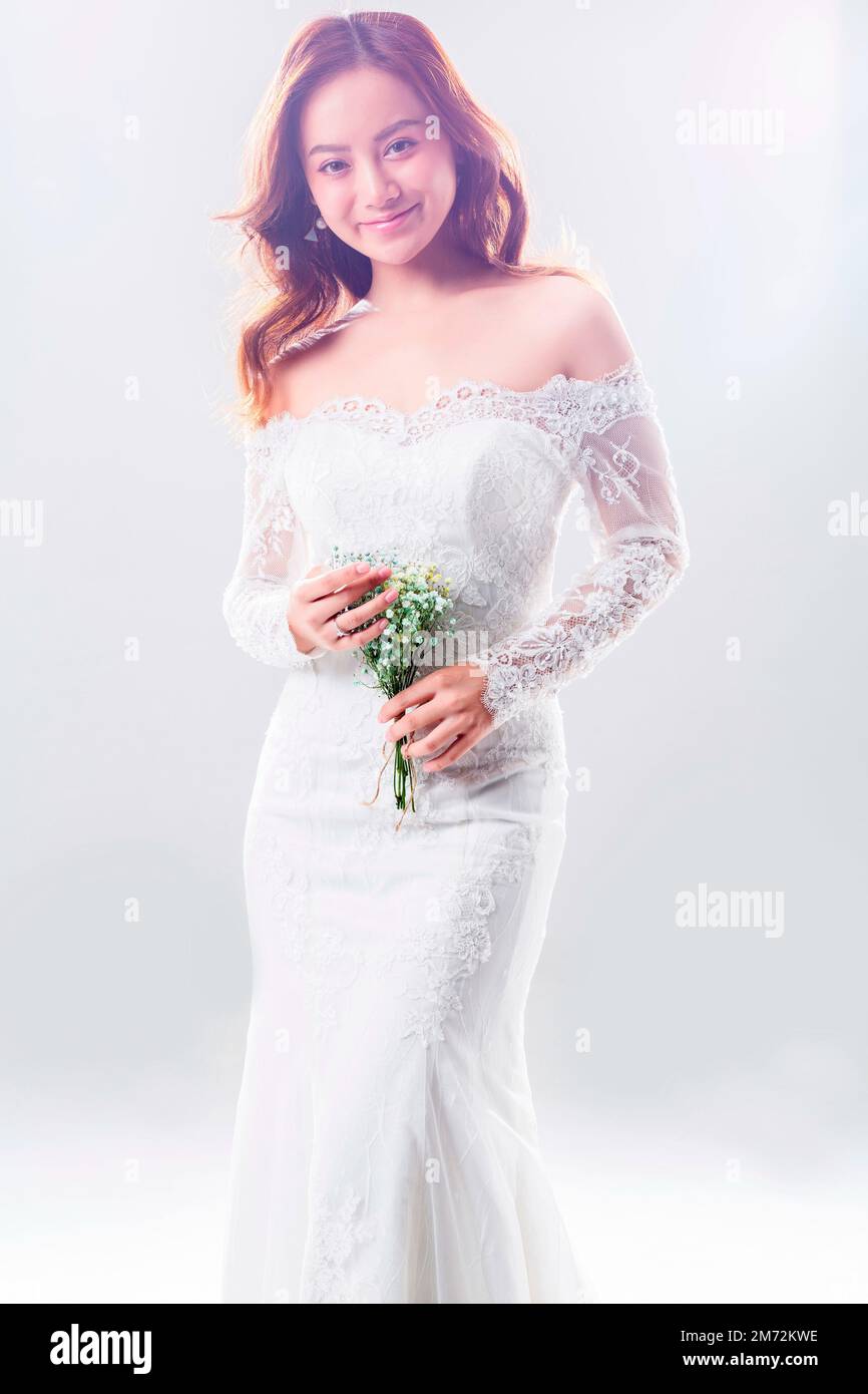 Happy and sweet bride and groom Stock Photo - Alamy