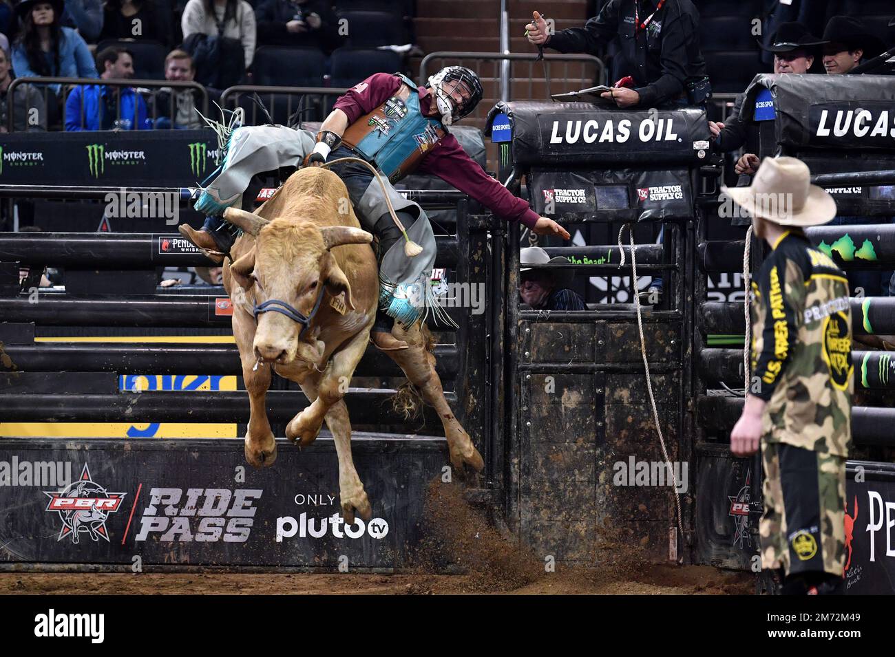 Professional Bull Rider Ednei Caminhas (BRA) rides a bull named Man ...