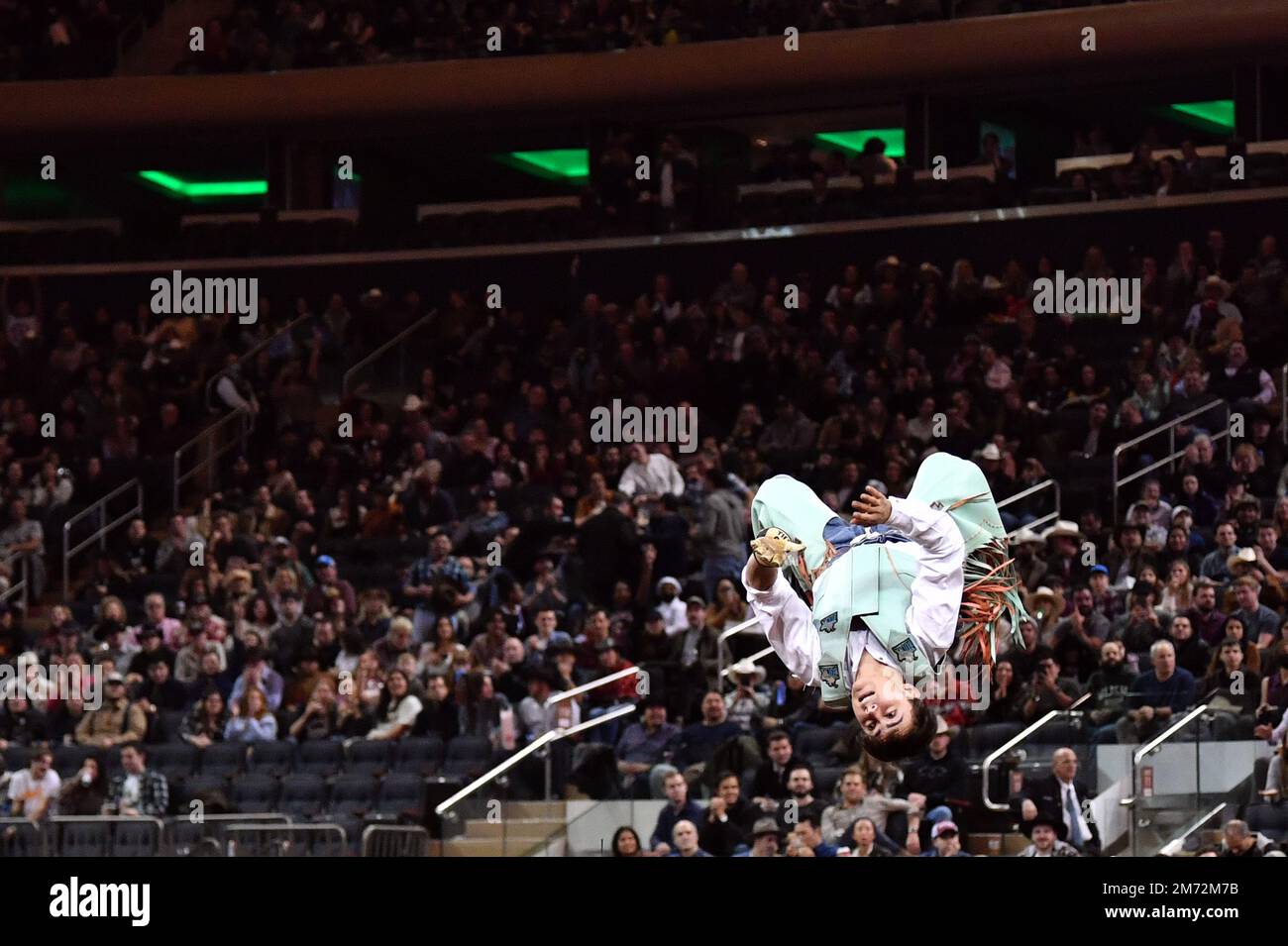 Professional Bull Rider Thiago Salgado (BRA) celebrates with a backflip ...
