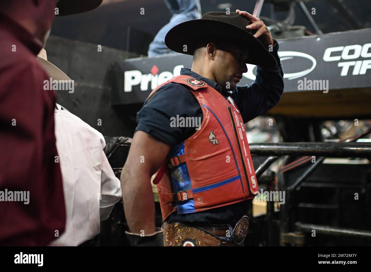Professional Bull Rider Alison de Souza prepares himself to compete in ...