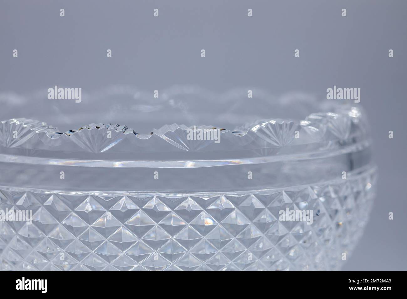 Defocused macro texture background of a shimmering modern lead crystal ...