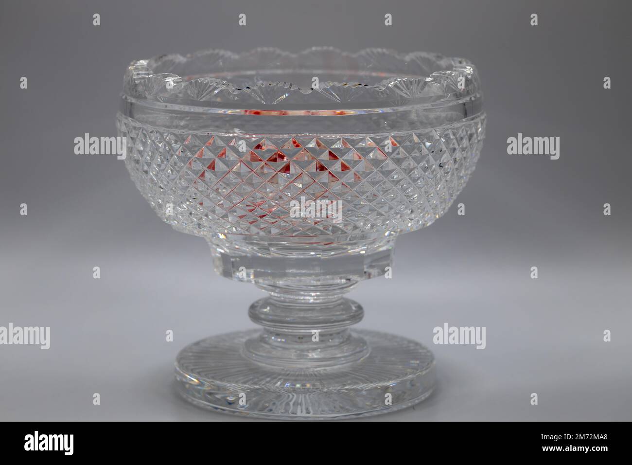 Macro view of a beautiful vintage lead crystal glass footed centerpiece ...