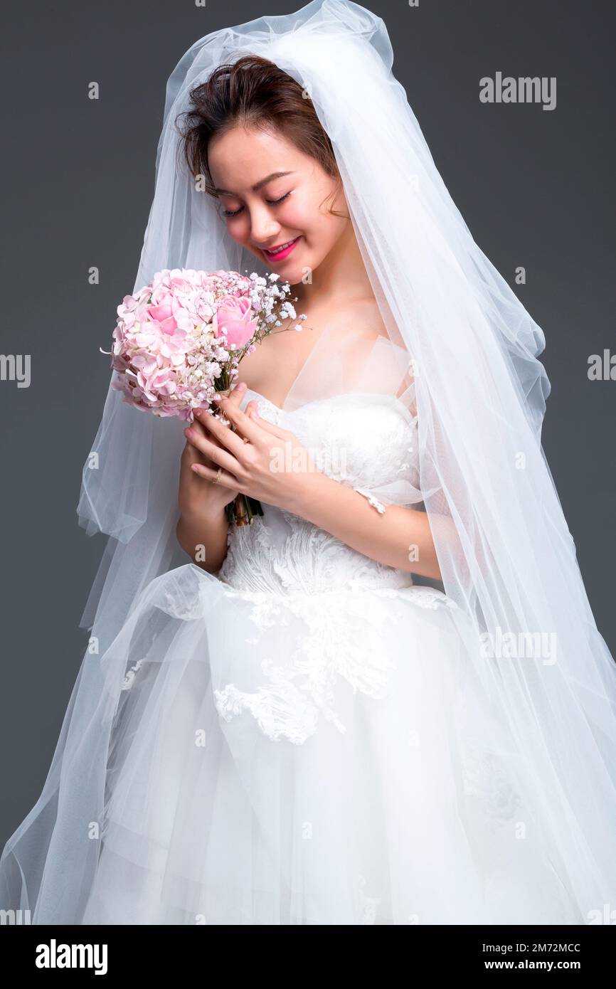Happy and sweet bride and groom Stock Photo - Alamy
