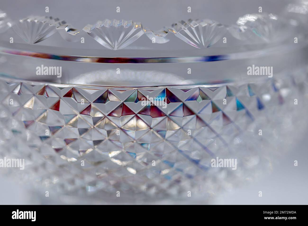 Defocused macro texture background of a shimmering modern lead crystal ...