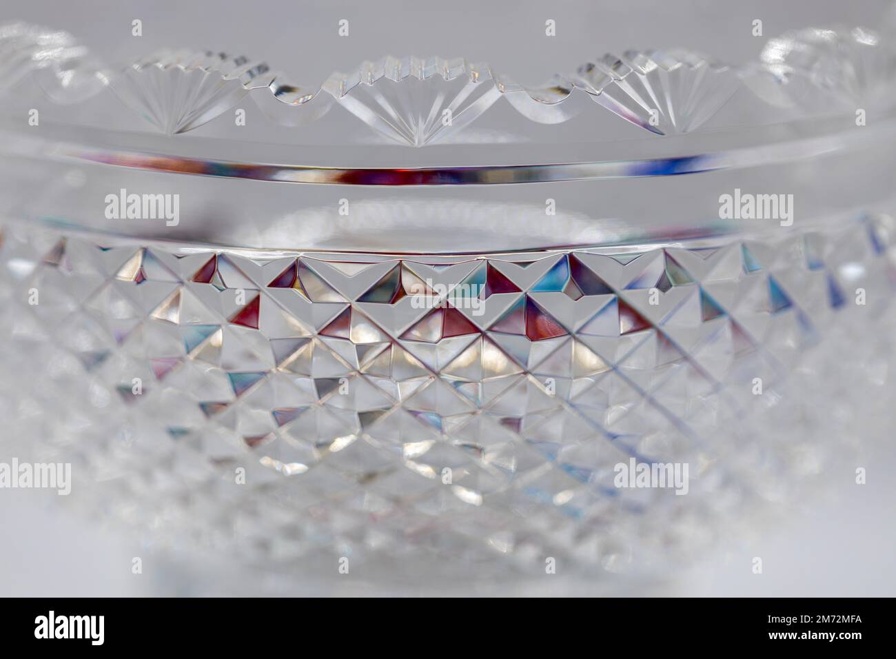 Defocused macro texture background of a shimmering modern lead crystal ...