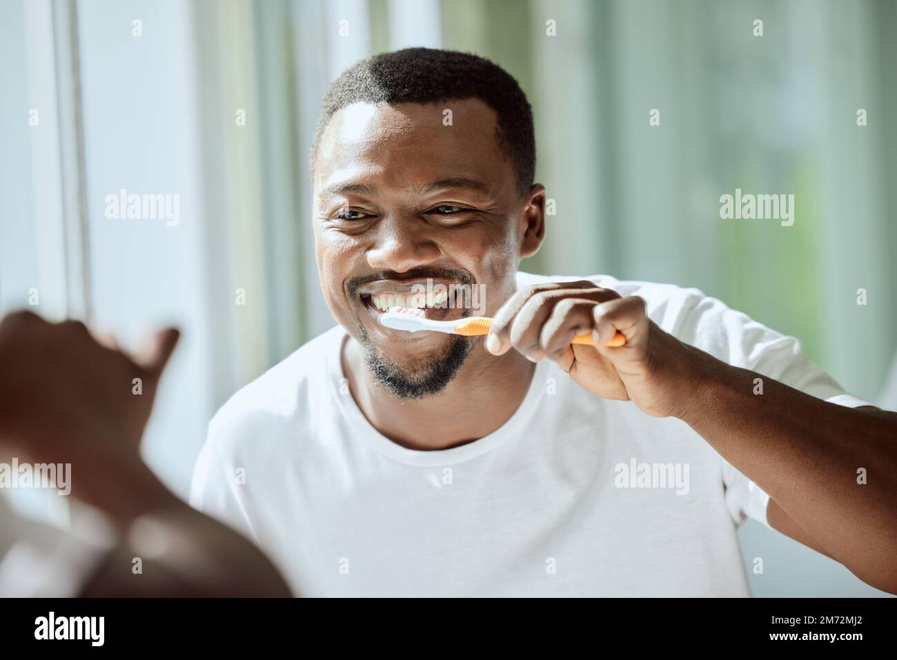 Morning, black man and dental brush wellness for health, hygiene and clean smile in mirror. Self ...