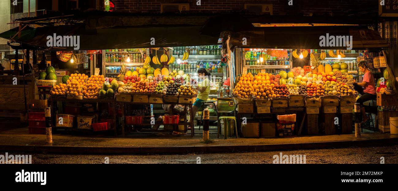 Hi-resolution panorama of a fruit and drinks stall at night in Sai Kung, New Territories, Hong ...