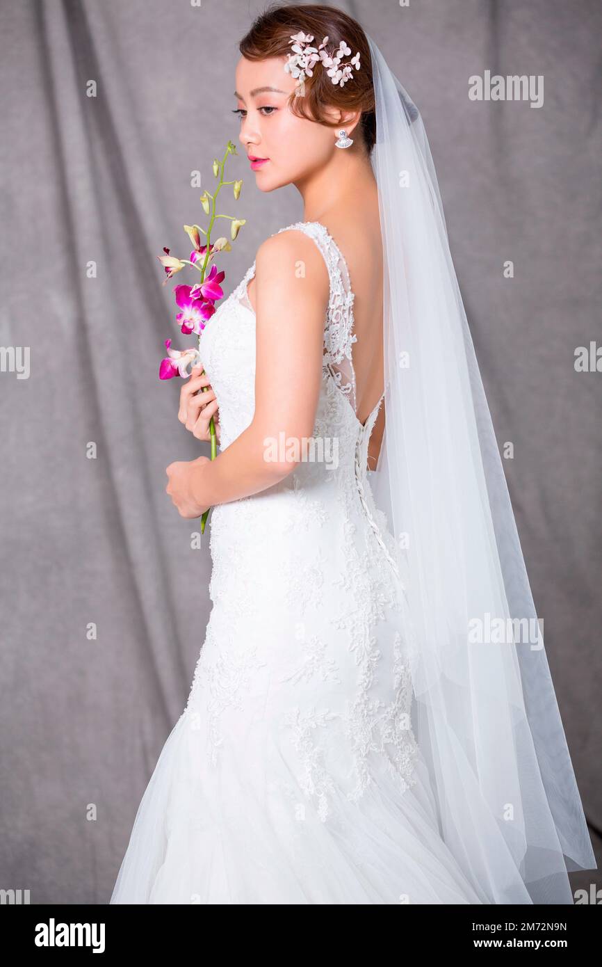 Happy and sweet bride and groom Stock Photo - Alamy