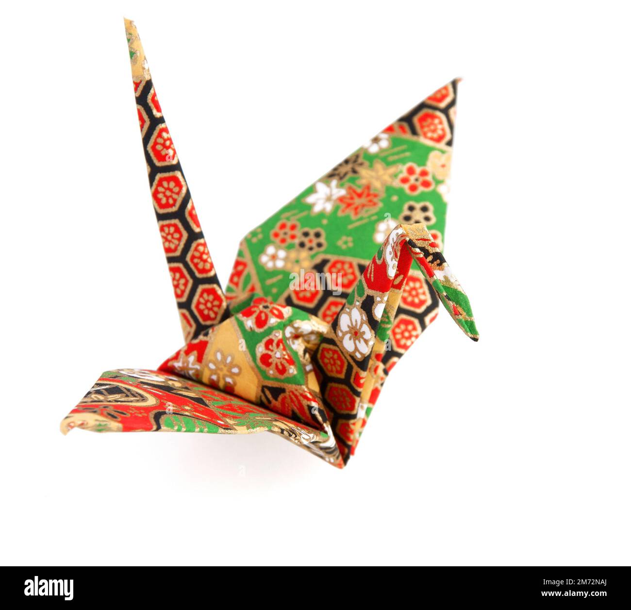 Origami Crane folded with a red floral pattern paper Stock Photo - Alamy