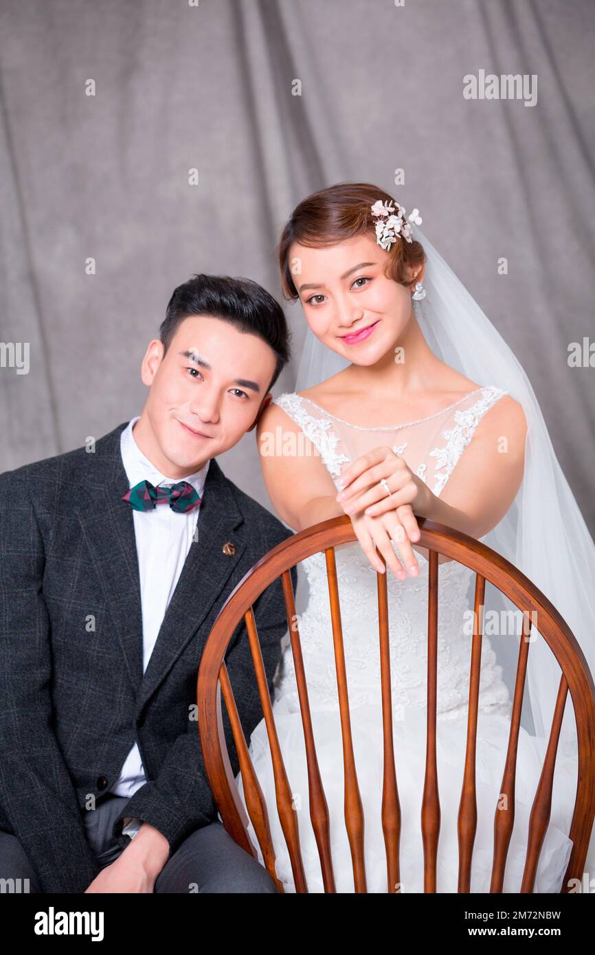 Happy and sweet bride and groom Stock Photo - Alamy