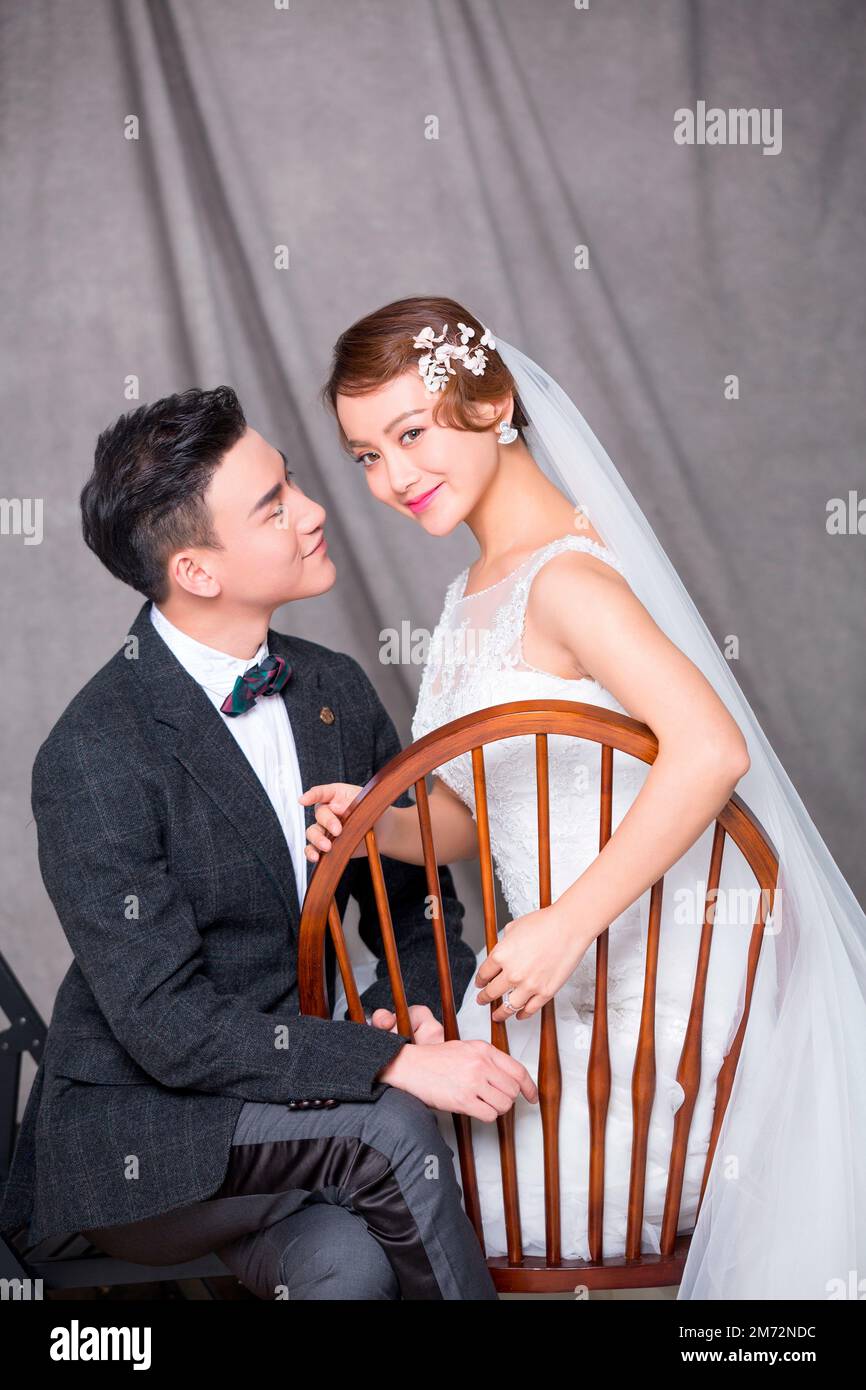 Happy and sweet bride and groom Stock Photo - Alamy