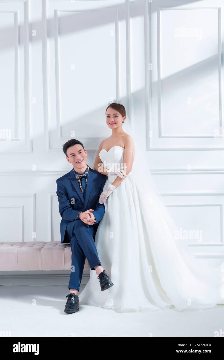 Happy and sweet bride and groom Stock Photo - Alamy
