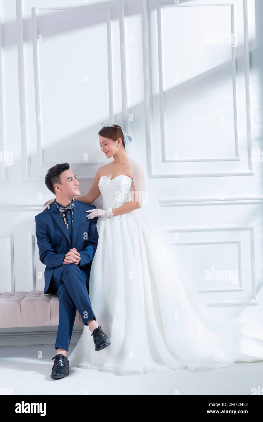 Happy and sweet bride and groom Stock Photo - Alamy