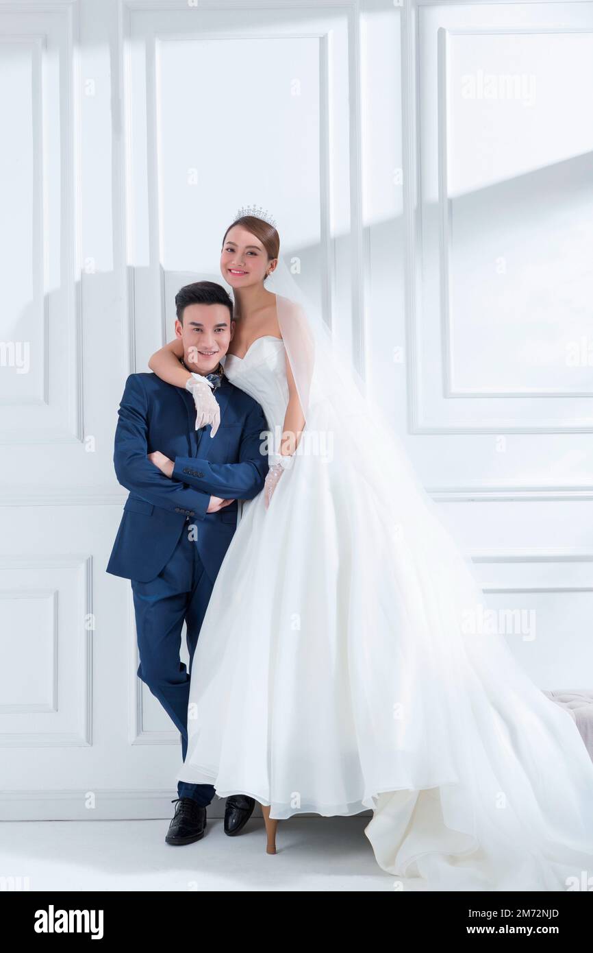 Happy and sweet bride and groom Stock Photo - Alamy