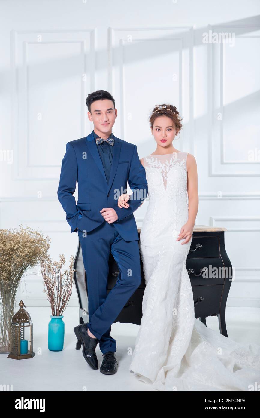 Happy and sweet bride and groom Stock Photo - Alamy