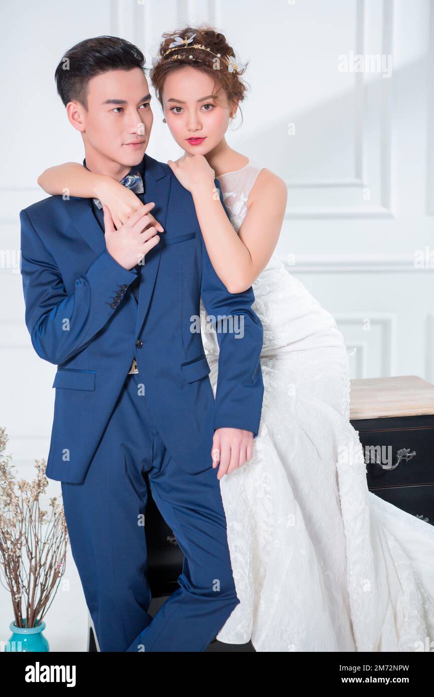 Happy and sweet bride and groom Stock Photo - Alamy