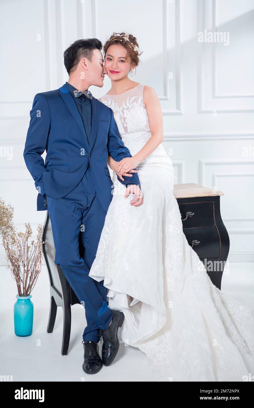 Happy and sweet bride and groom Stock Photo - Alamy
