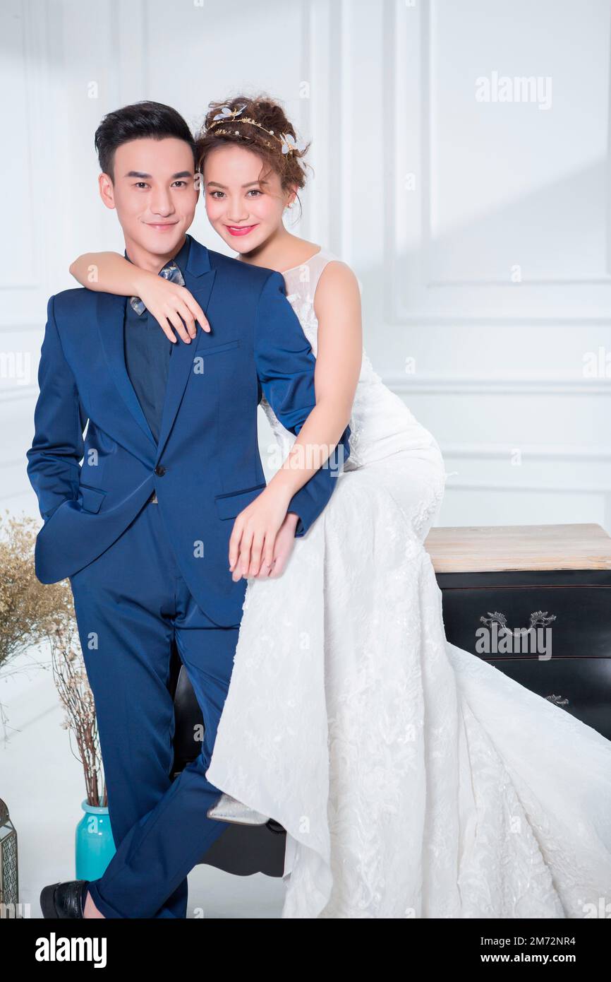 Happy and sweet bride and groom Stock Photo - Alamy