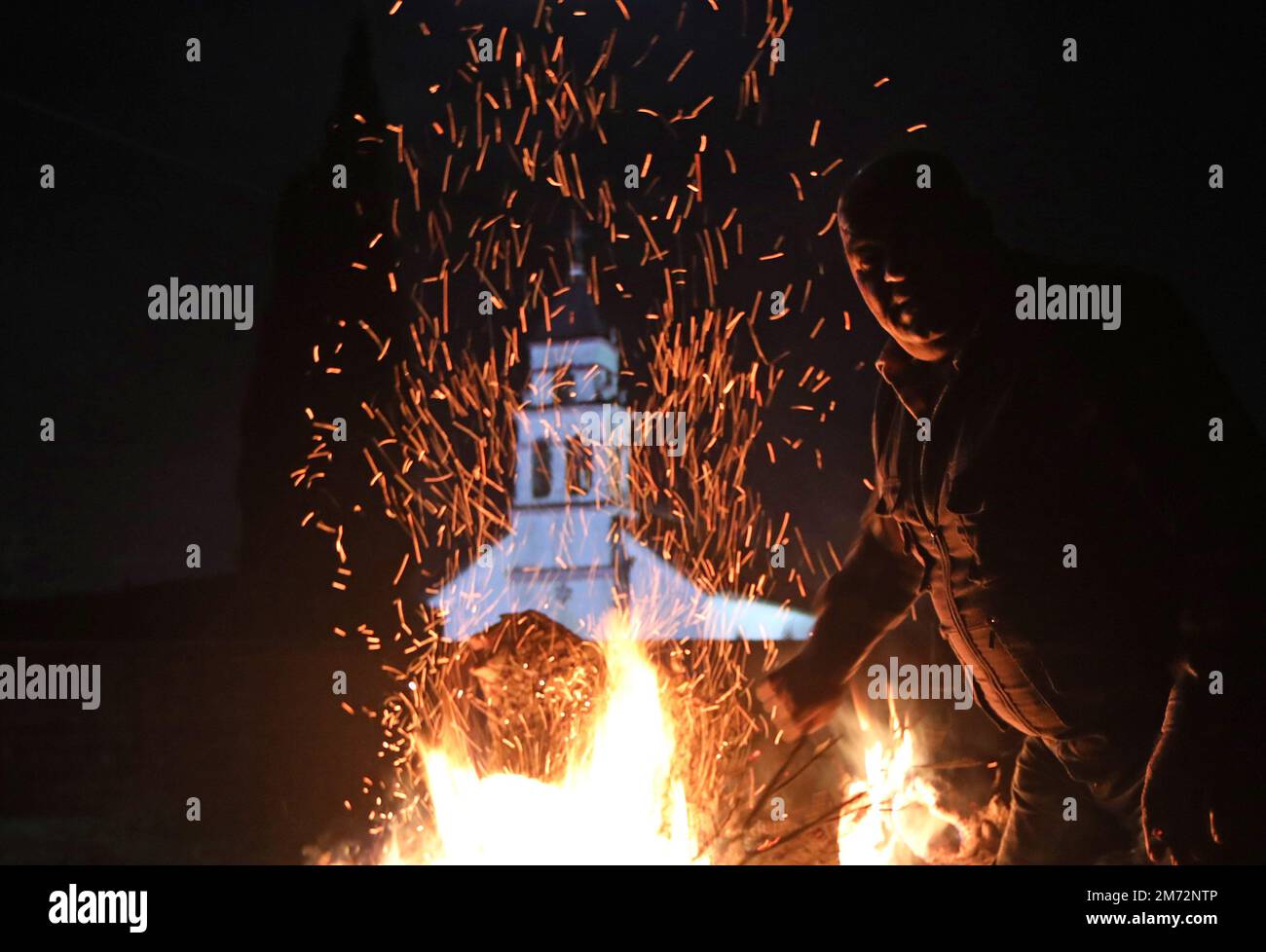 Burning dried oak branches, which symbolise the Yule log, on the ...