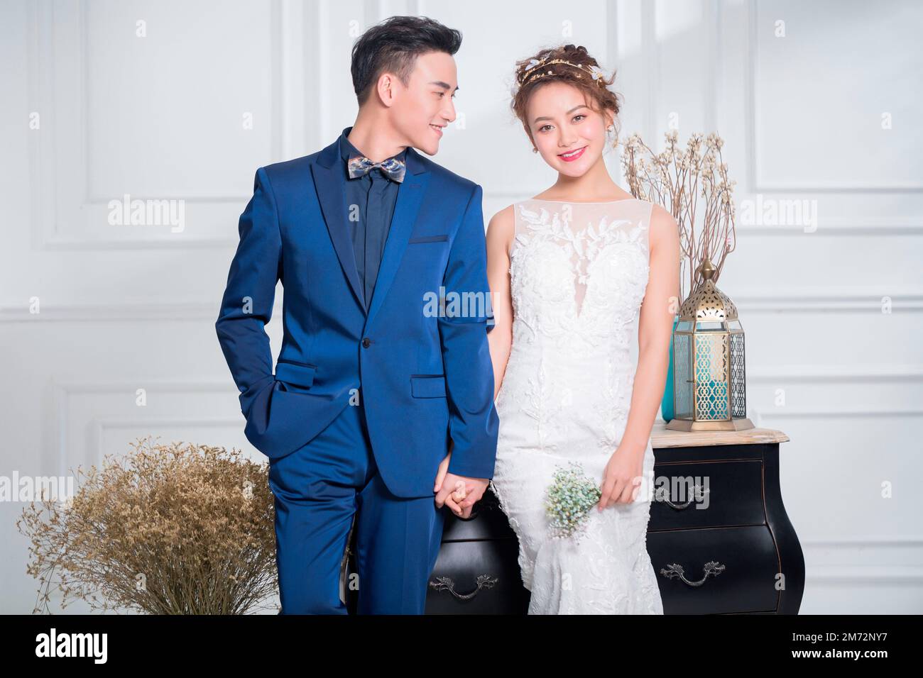 Happy and sweet bride and groom Stock Photo - Alamy