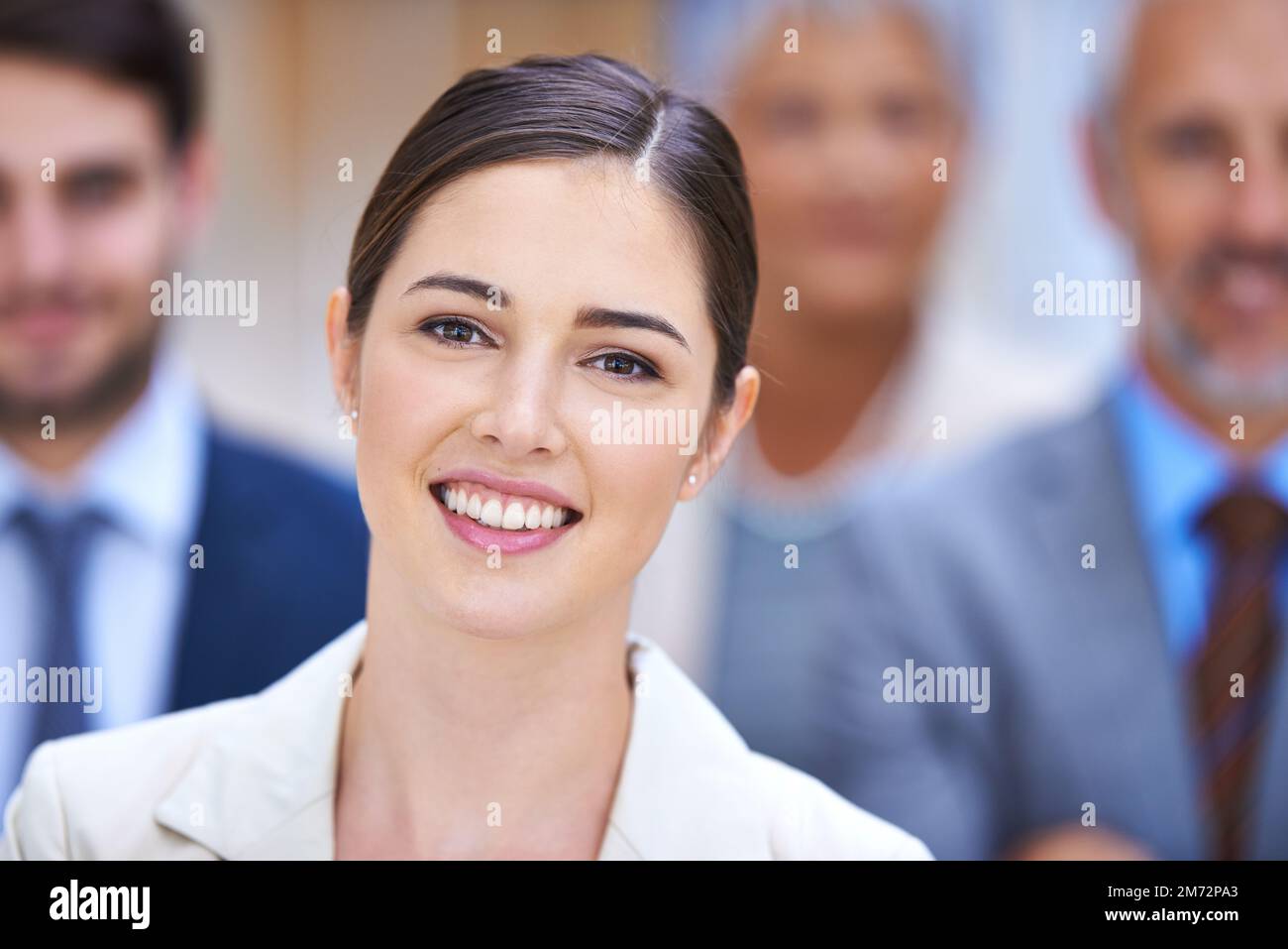 A company of achievers. a group of confident businesspeople Stock Photo ...