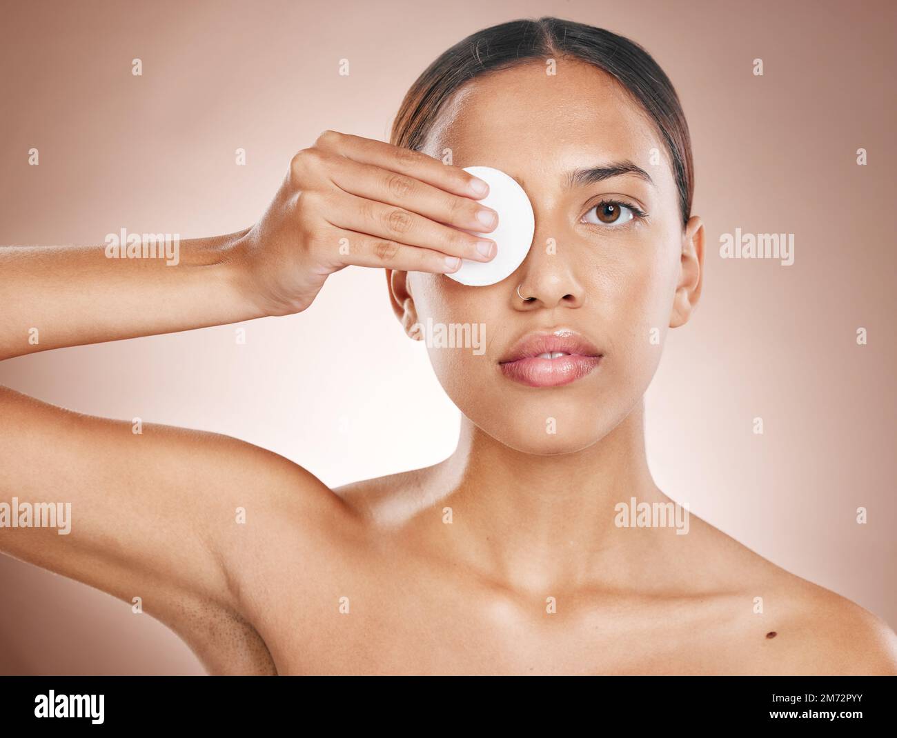 Beauty portrait, woman and face with cotton pad for makeup removal ...