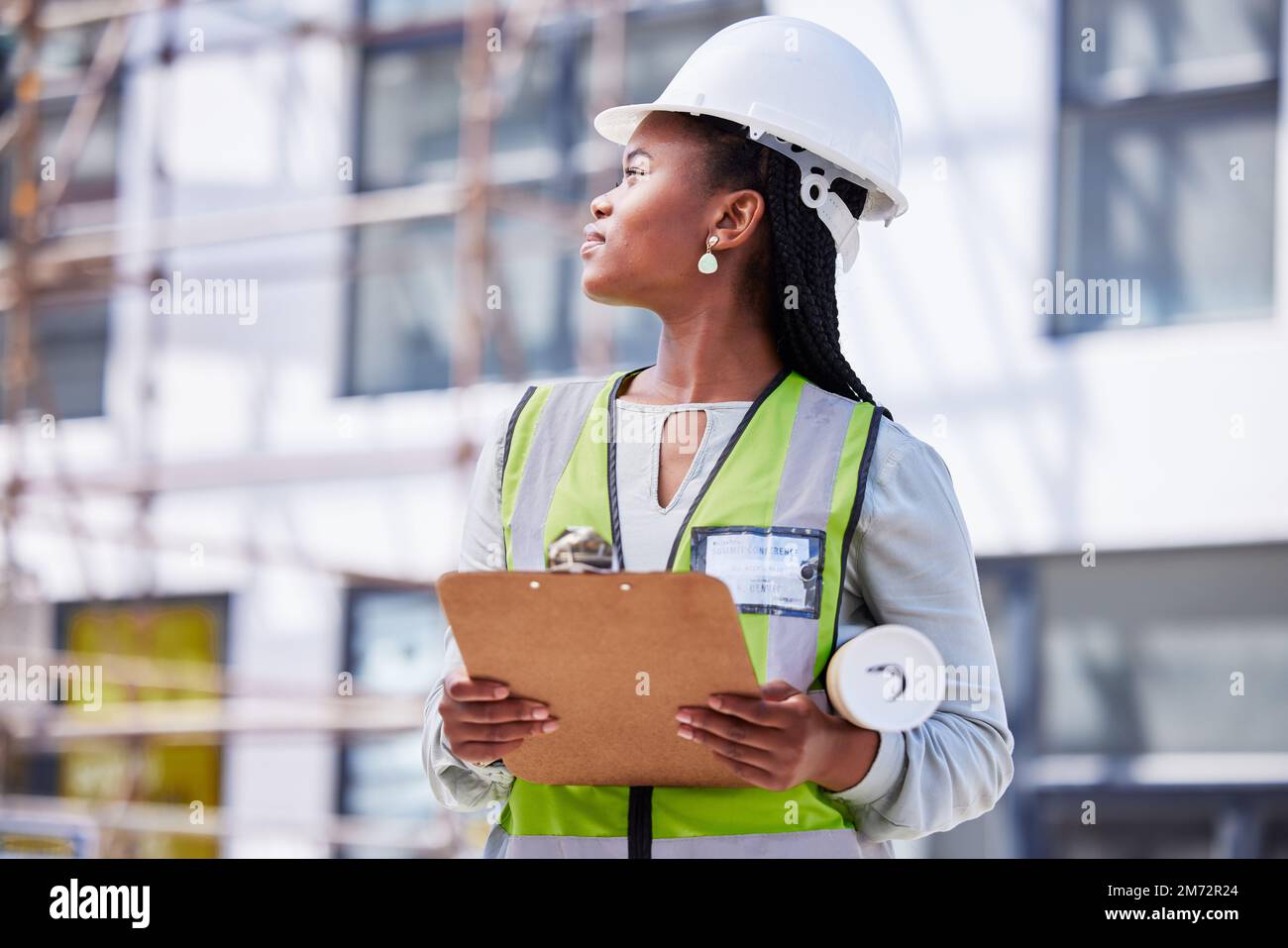 Architecture, checklist and project management with black woman at ...